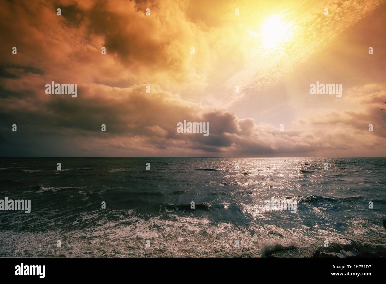 Seascape in the early morning. Dramatic sunrise over the sea. Nature ...
