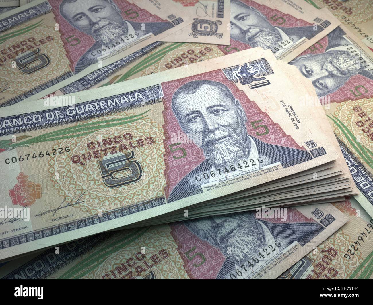 Money of Guatemala. Quetzal bills. GTQ banknotes. 5 Spanish. Business ...