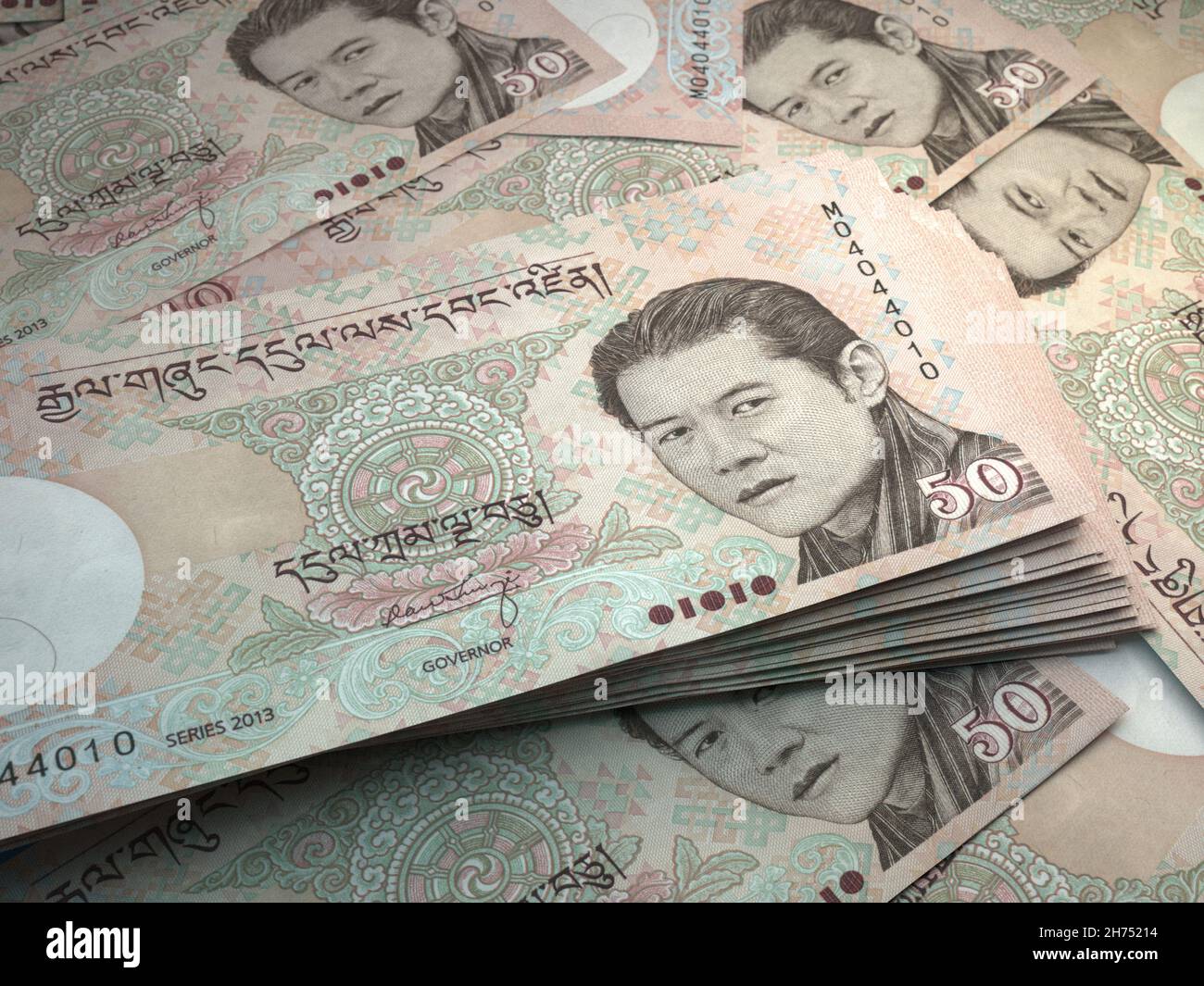 Money of Bhutan. Ngultrum bills. BTN banknotes. 50 Dzongkha. Business ...