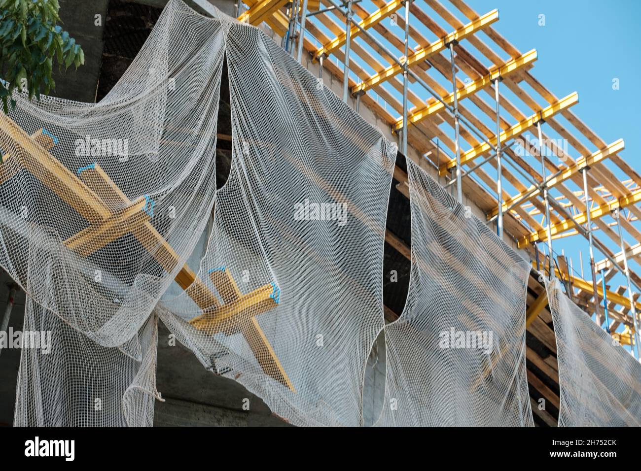 Protective building network used on building Stock Photo - Alamy