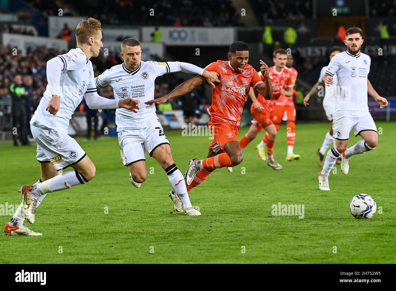 Demi Mitchell #15 of Blackpool and Matt Grimes #8 of Swansea City ...