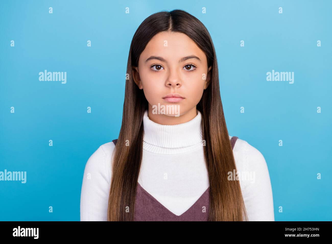 Photo of young charming school girl concentrated focused clever wear casual clothes isolated ...