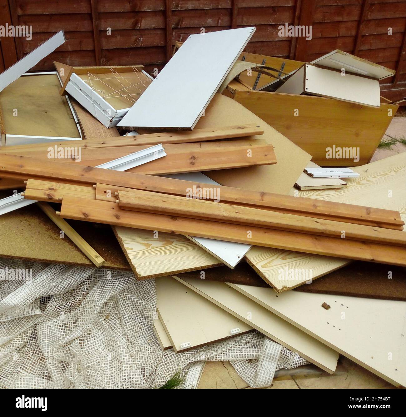 Pile of wood pieces on the table with materials of different sizes and ...