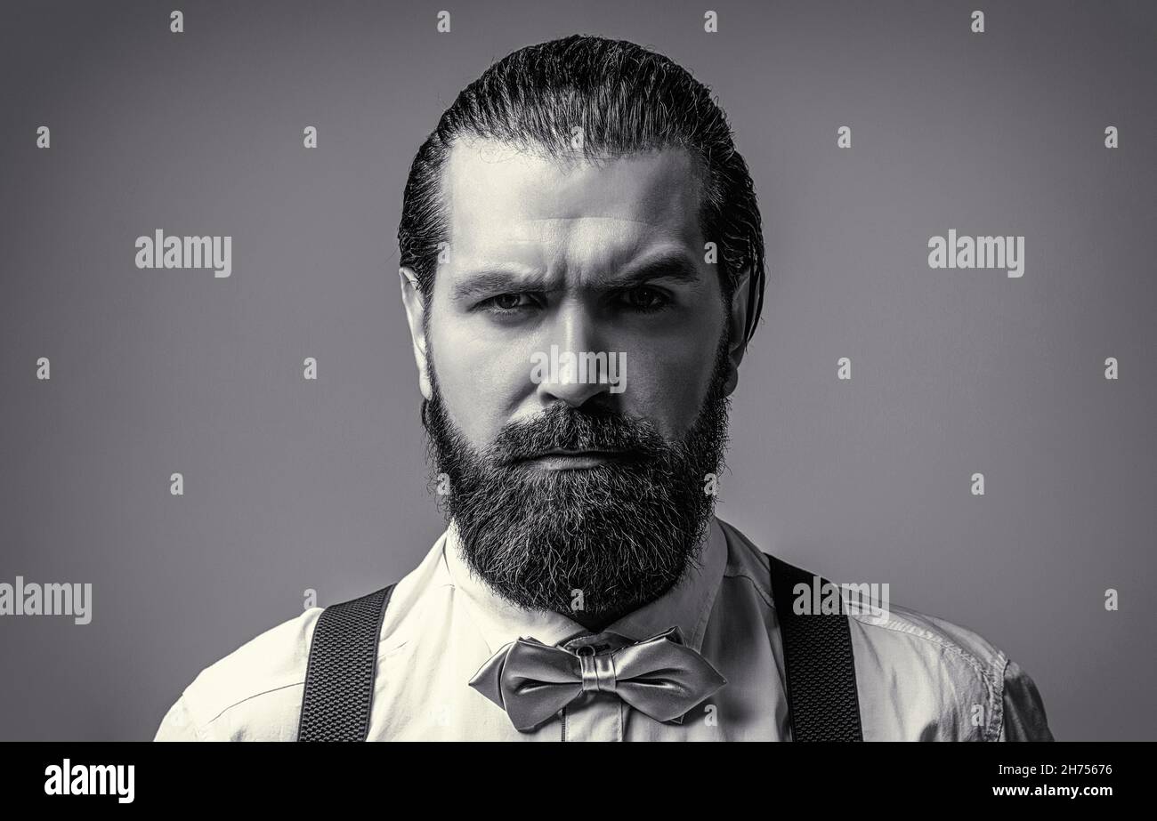 Man wearing white shirt and suspenders hi-res stock photography and ...