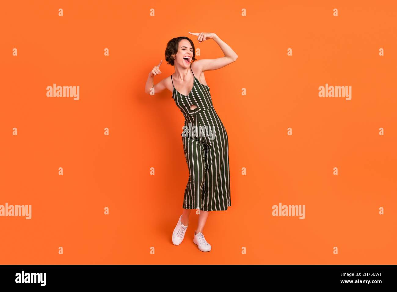 Full length photo of young girl happy positive smile have fun dance ...