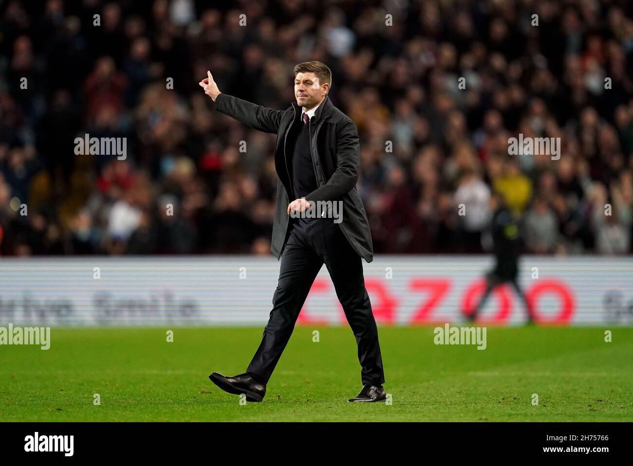 Aston Villa manager Steven Gerrard signals to his players to ...