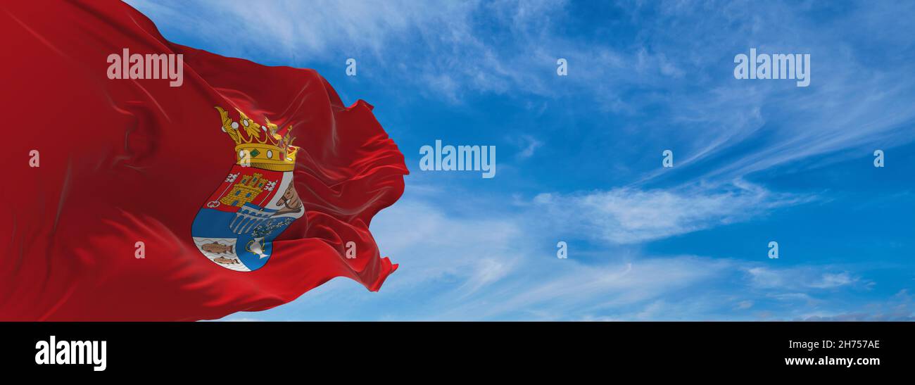 flag of Segovia province , Spain at cloudy sky background on sunset ...