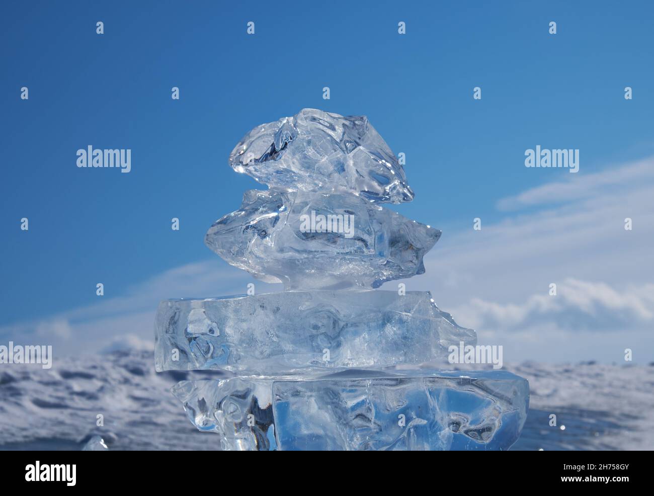 Ice floe crystal under blue sky background Stock Photo - Alamy