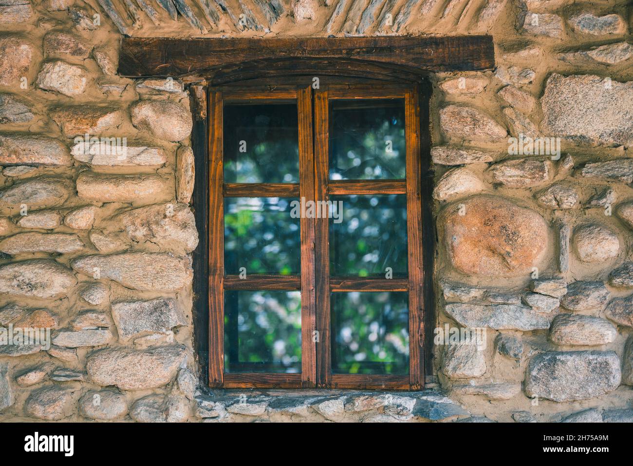 Old wooden window on a vintage stone wall Stock Photo - Alamy