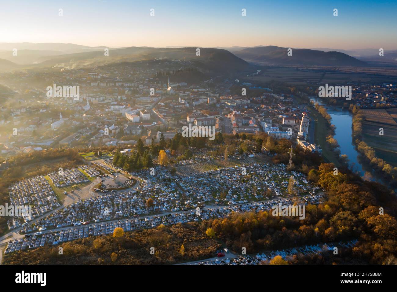 Aerial drone view of cemetery and graves in Dej city, Romania ...