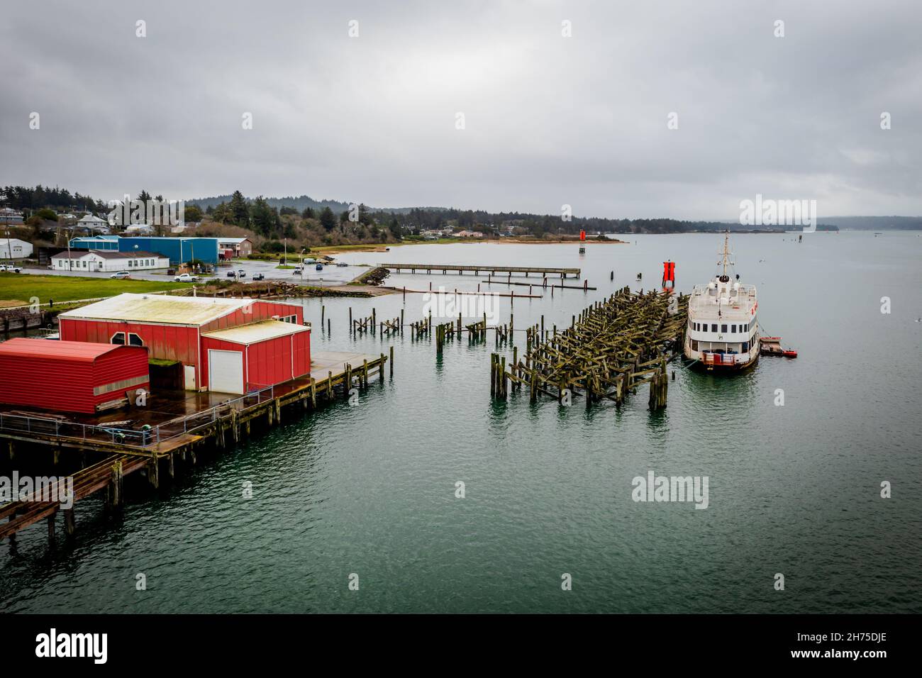 Old ferry boat moored at Empire Dock in Coos Bay, Oregon, aerial Stock ...