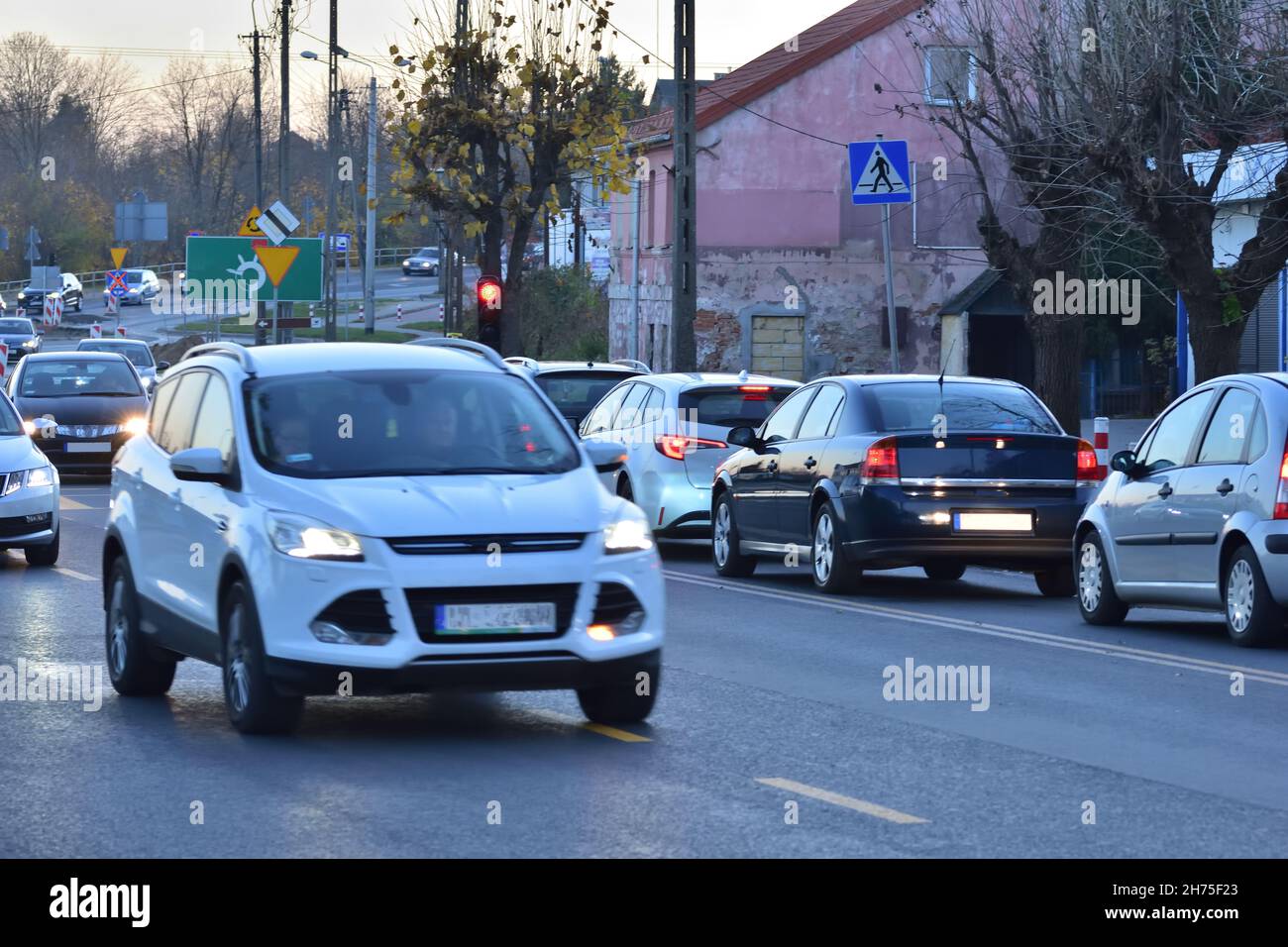 Traffic jam and high beam swinging lights when crossing a road work ...