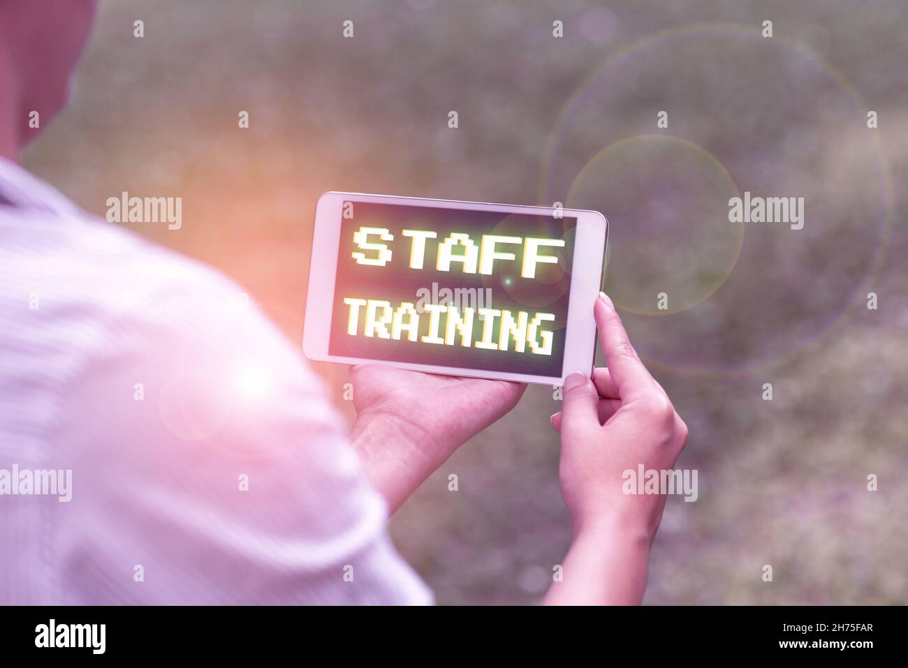 Hand writing sign Staff Training. Word Written on learn specific ...