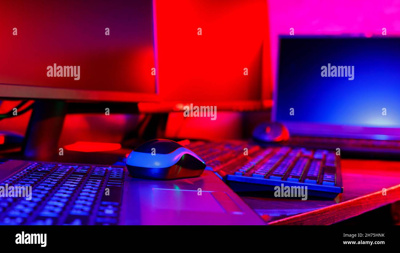 Dark room for a gamer with neon lights. Interior for computer games ...