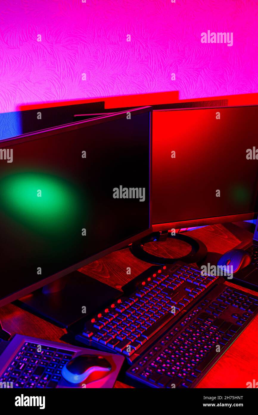 Dark room for a gamer with neon lights. Interior for computer games ...