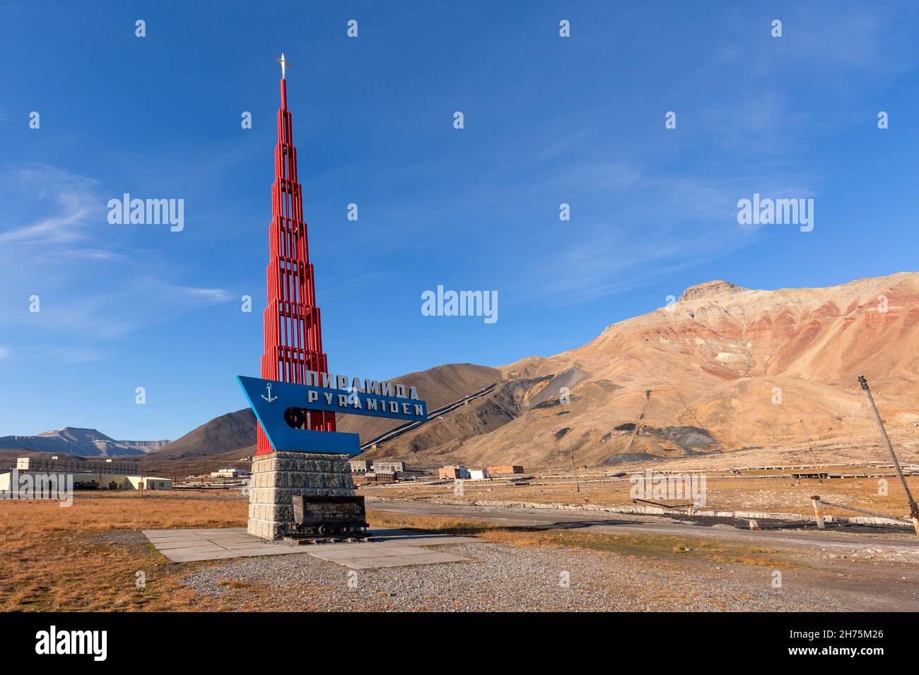 monument in abandoned soviet russian mining village of pyramiden ...
