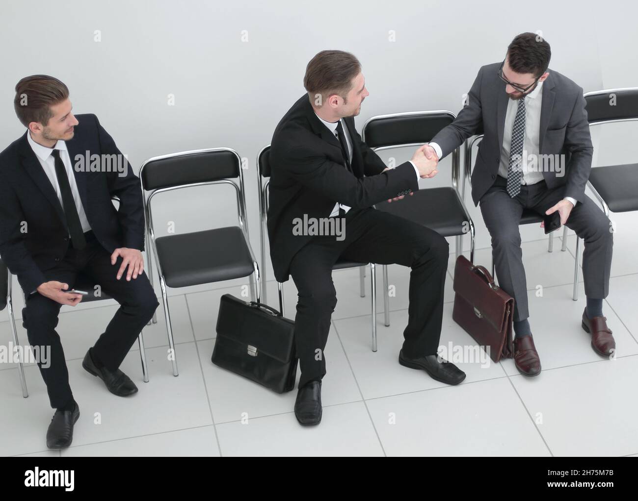 top view.employees sitting in the office hallway Stock Photo - Alamy