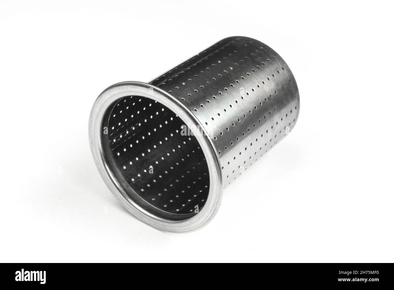 Metallic teapot filter isolated on white background. Stainless strainer ...