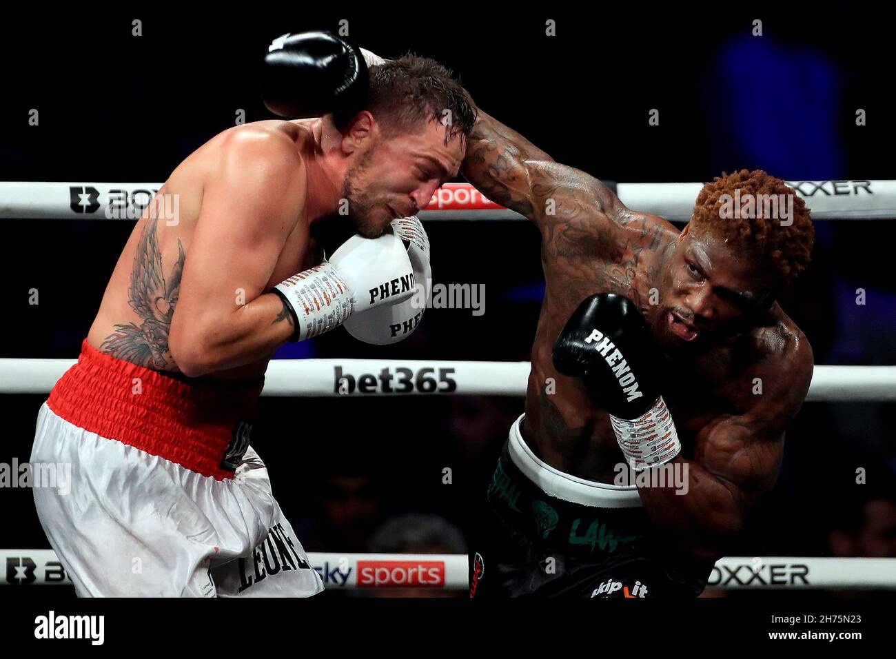 LONDON, ENGLAND - NOVEMBER 20th: Mikael Lawal (L) in action against ...