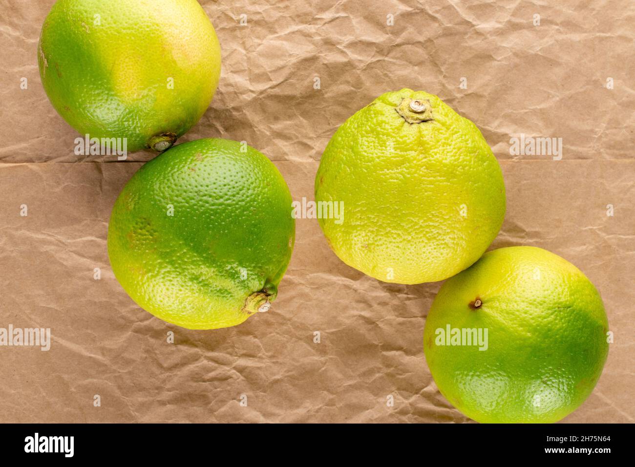 Four fragrant bergamots on craft paper, close-up, top view Stock Photo ...
