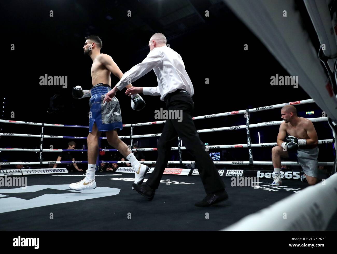 Hassan Azim (left) after knocking out Ivan Njegac to win the welter ...