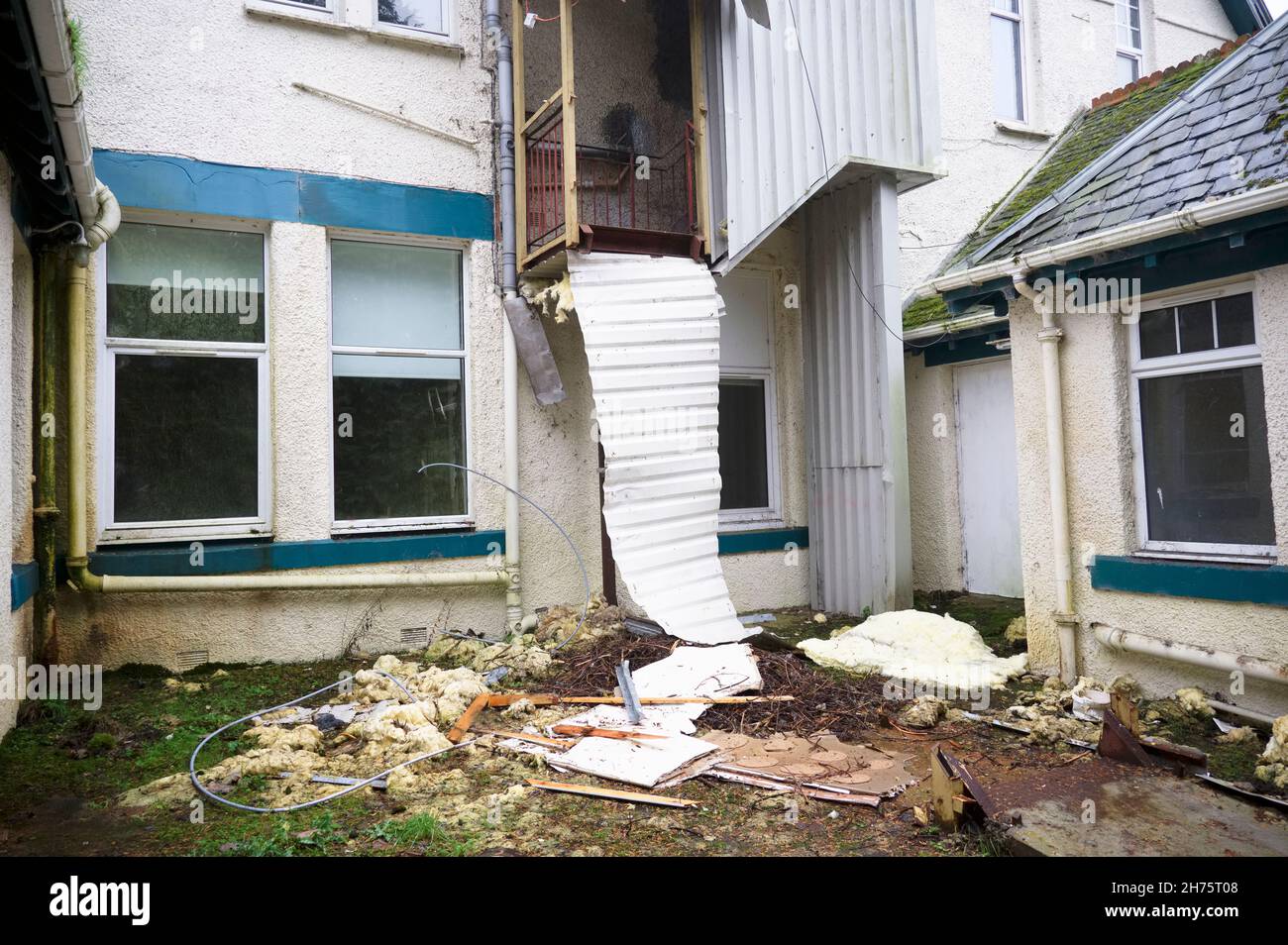 Demolition in progress of derelict house on construction building site ...