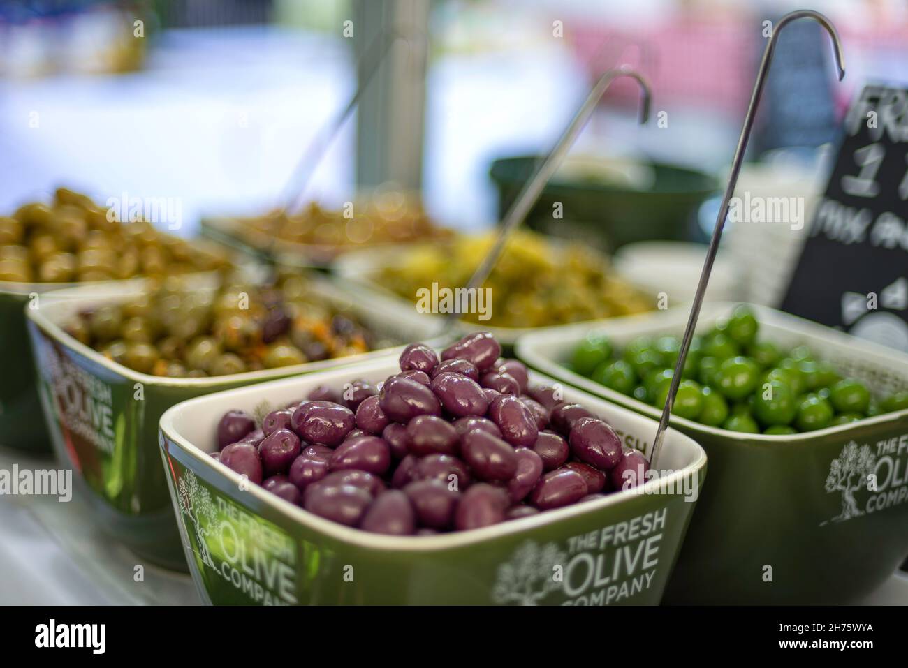 Selection of olives on display at Soho Food Feast Stock Photo - Alamy