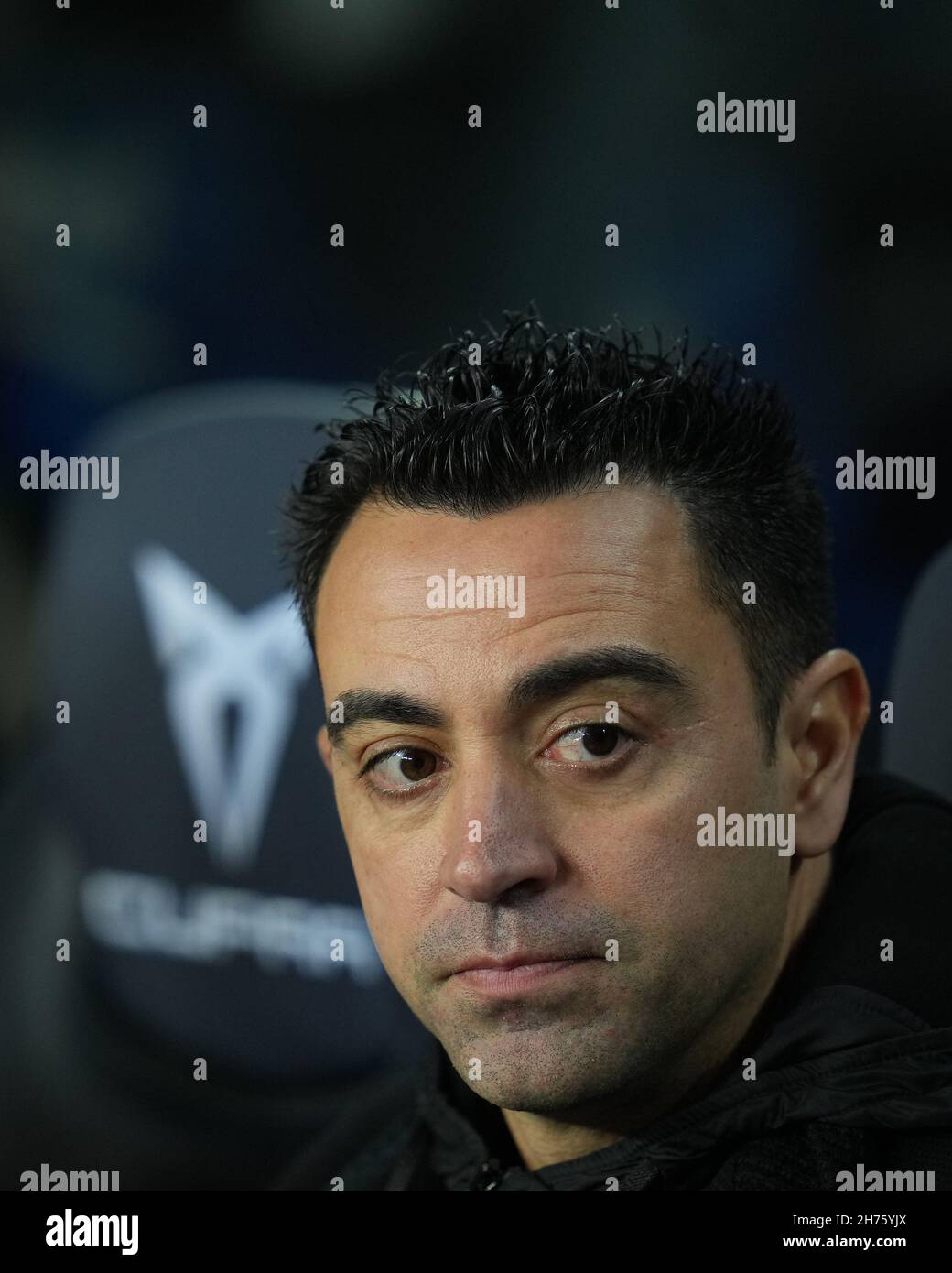 The new FC Barcelona head coach Xavi Hernandez on the bench during the ...