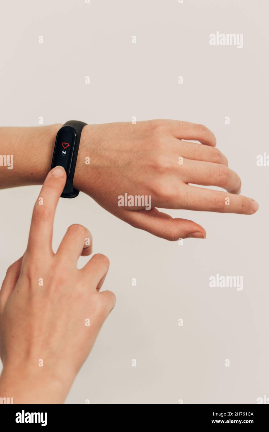 Smart Watch on a Human Hand. White background Stock Photo - Alamy