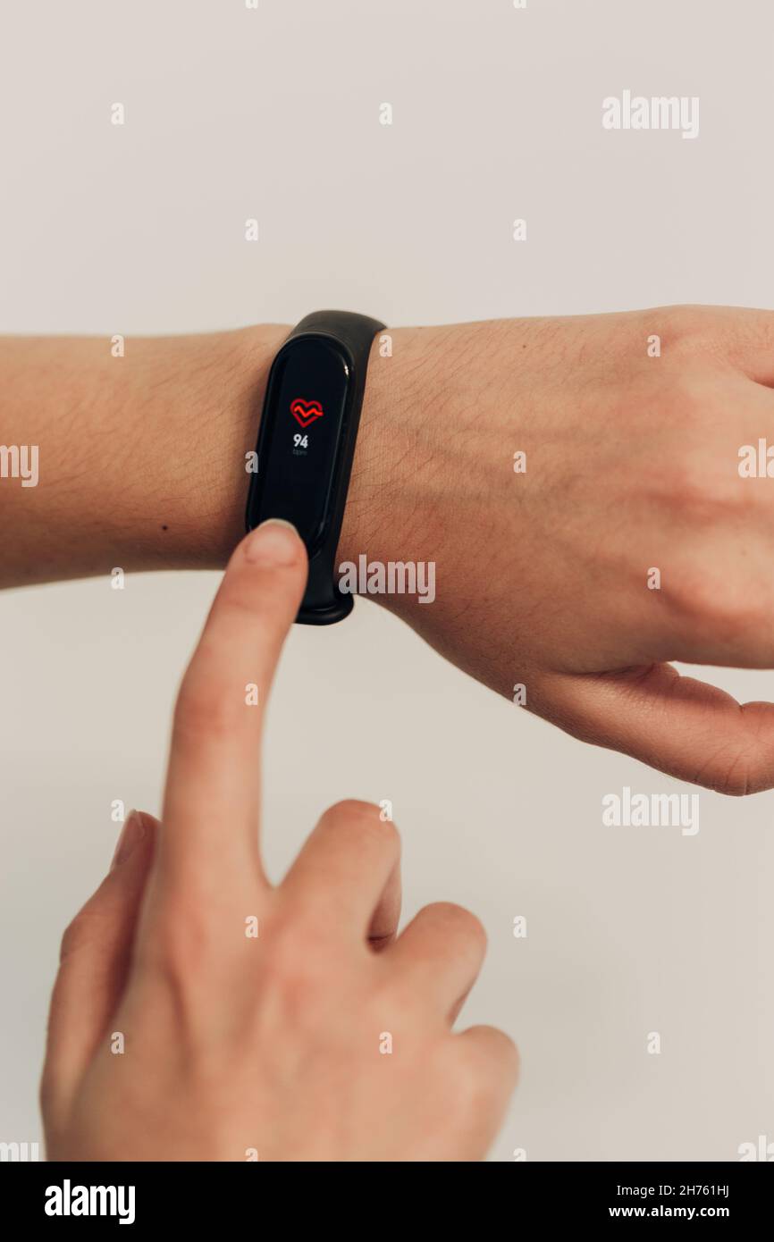 Smart Watch on a Human Hand. Heartbeat check Stock Photo - Alamy