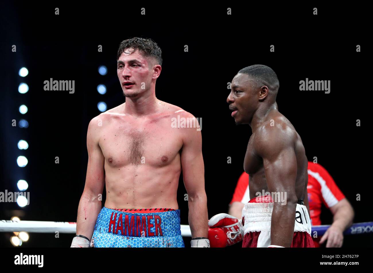 Hosea Burton (left) and Dan Azeez in the British Light Heavyweight Title fight during the BOXXER ...