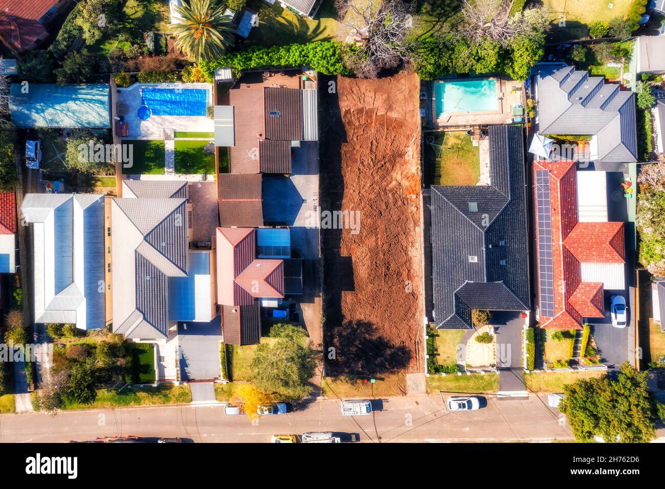 Demolished home building construction site in residential suburb of ...