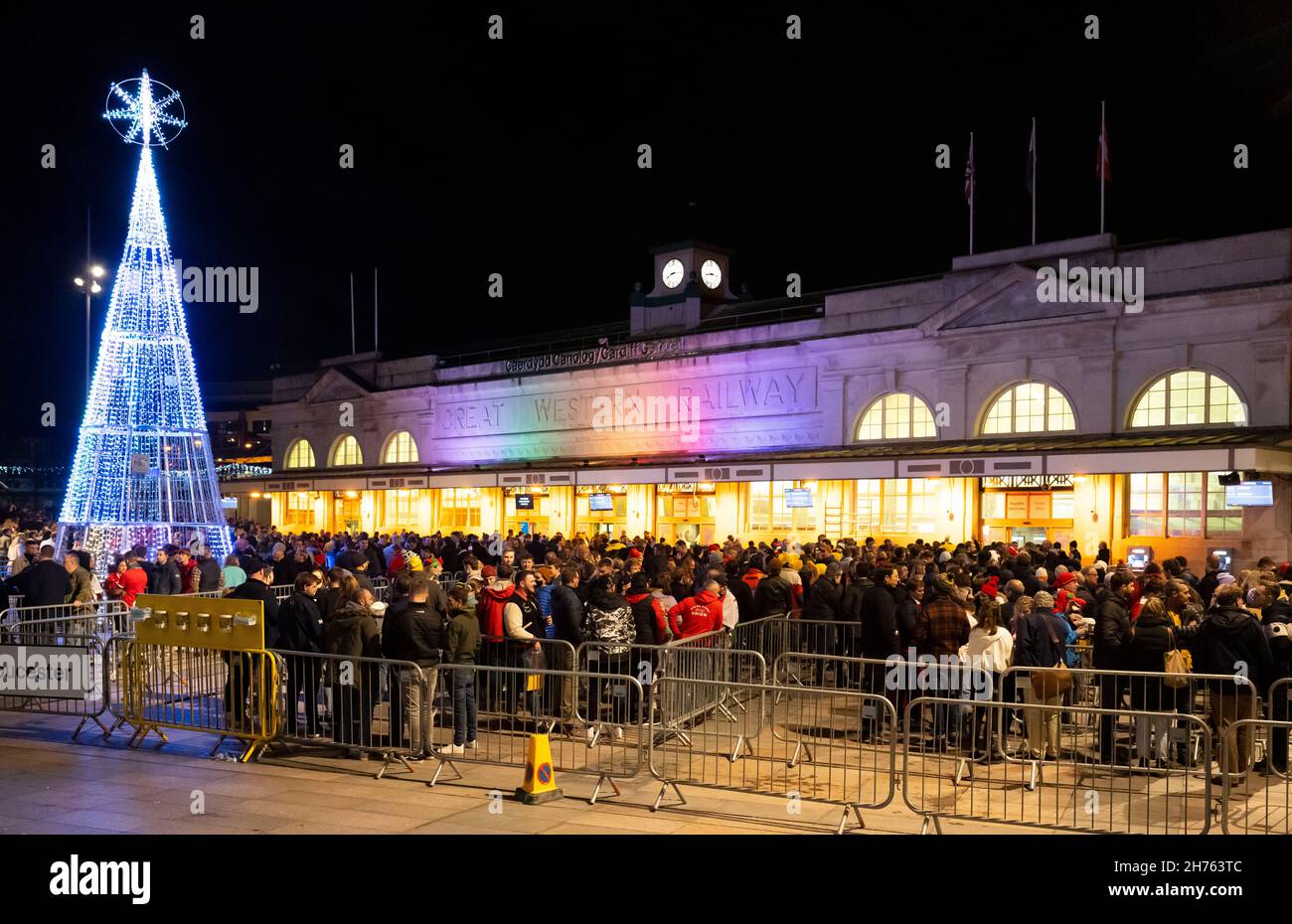 CARDIFF, WALES - NOVEMBER 20: Fans outside Cardiff Central Station ...