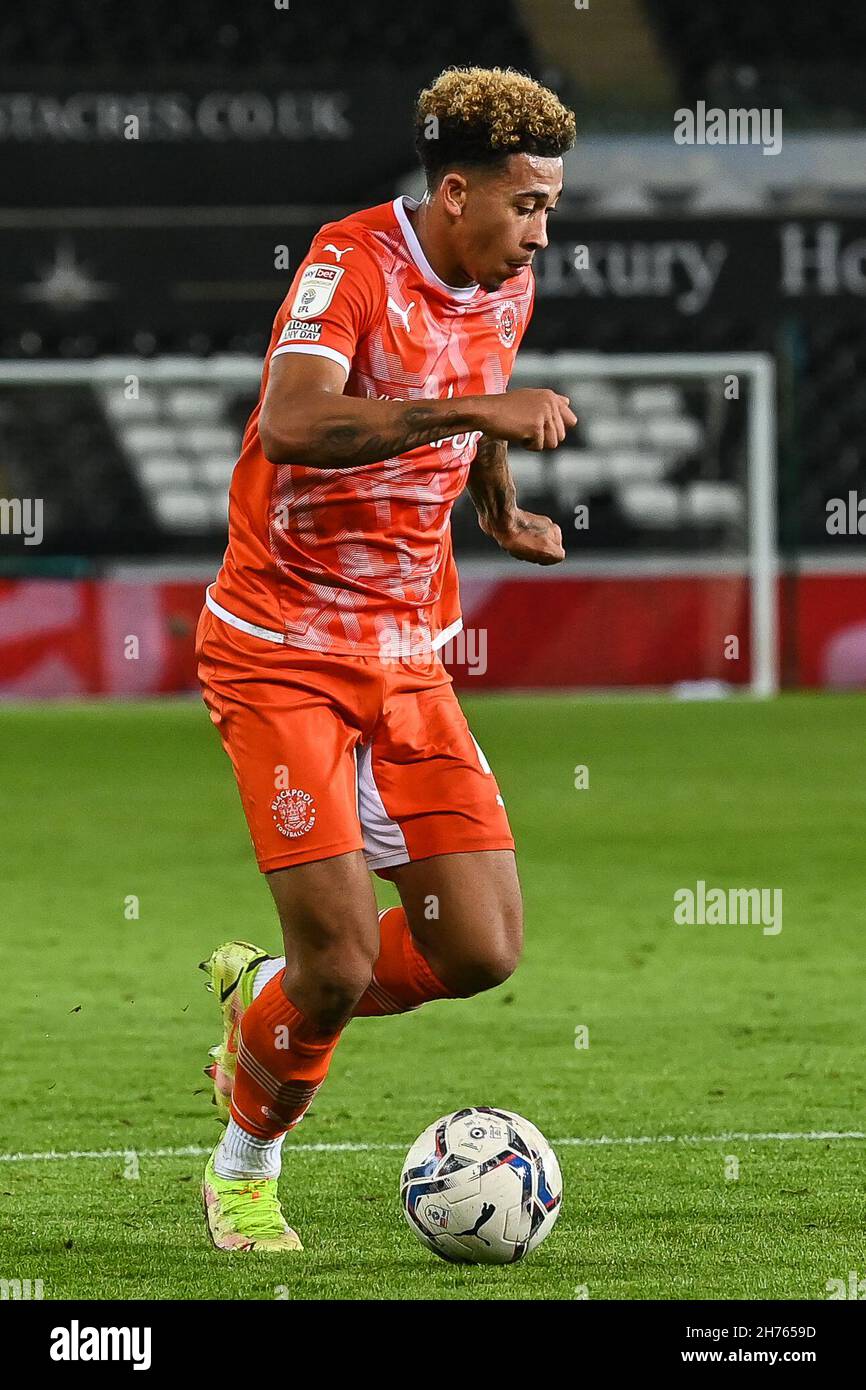 Jordan Lawrence-Gabriel #4 of Blackpool makes a break with the ball ...