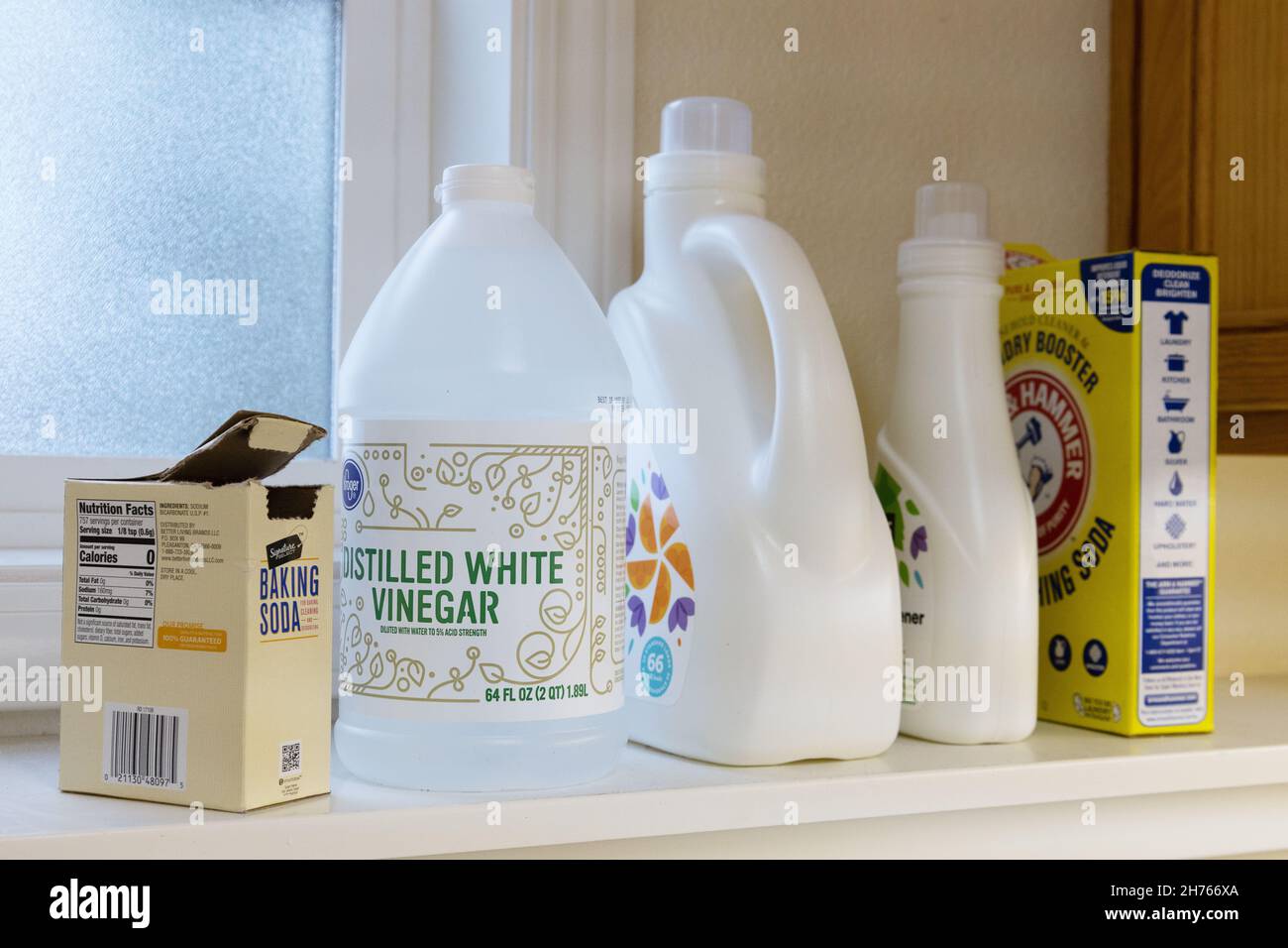 Natural laundry cleaning products on a shelf in a laundry room Stock ...