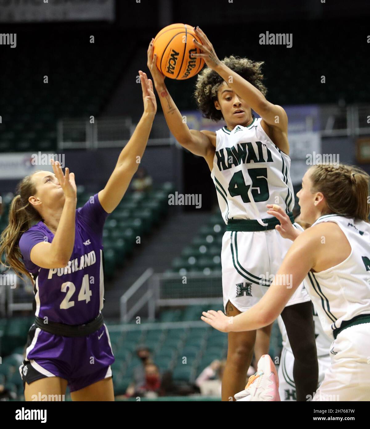 November 19, 2021 - Hawai'i Rainbow Wahine guard Olivia Davies #45 brings in a rebound over ...