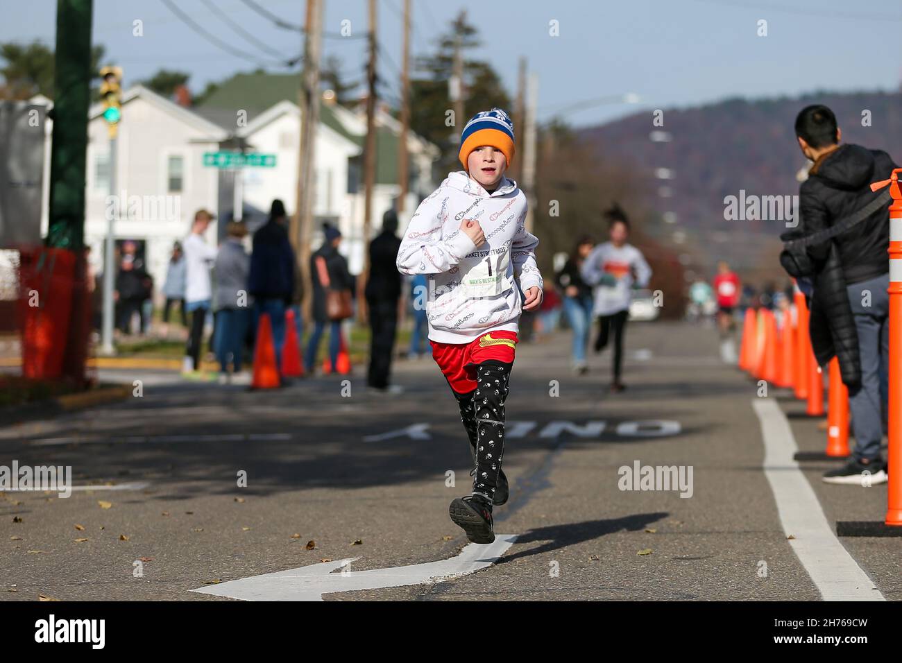 Joey Serafin, age 10, runs in the 63rd annual C.W. Heller Memorial 5K ...