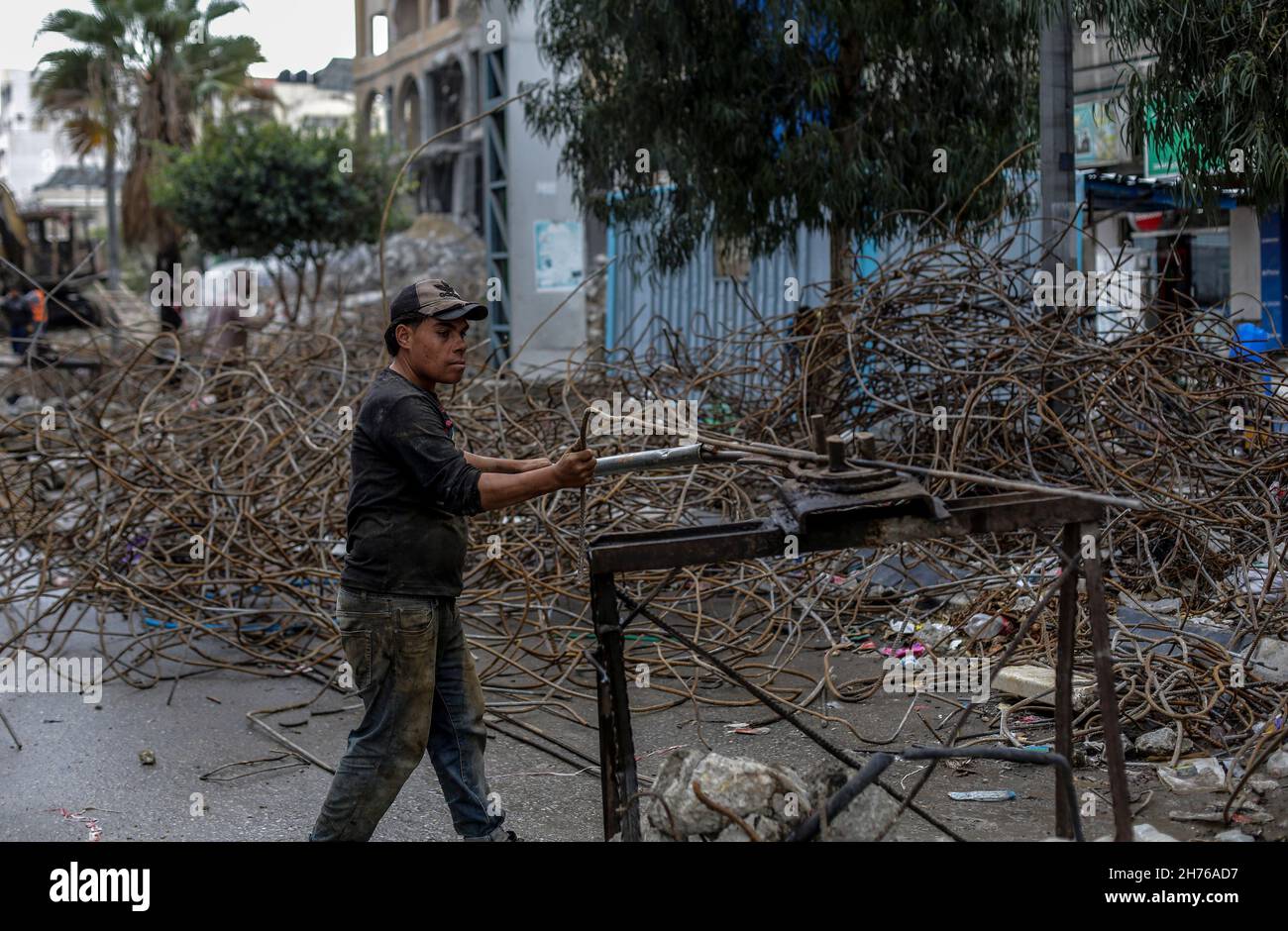 Gaza, Palestine. 20th Nov, 2021. A Palestinian worker collects scrap ...