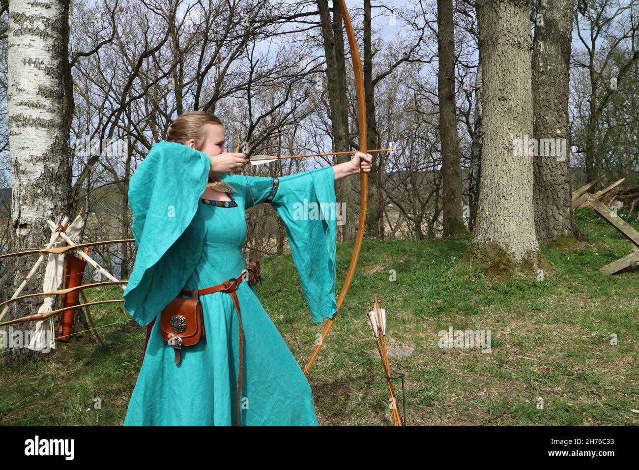 female viking having long bow and attitude Stock Photo - Alamy