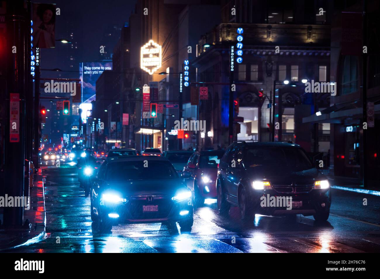 Toronto, Canada - 10 30 2021: Night rain pouring down on cars standing ...