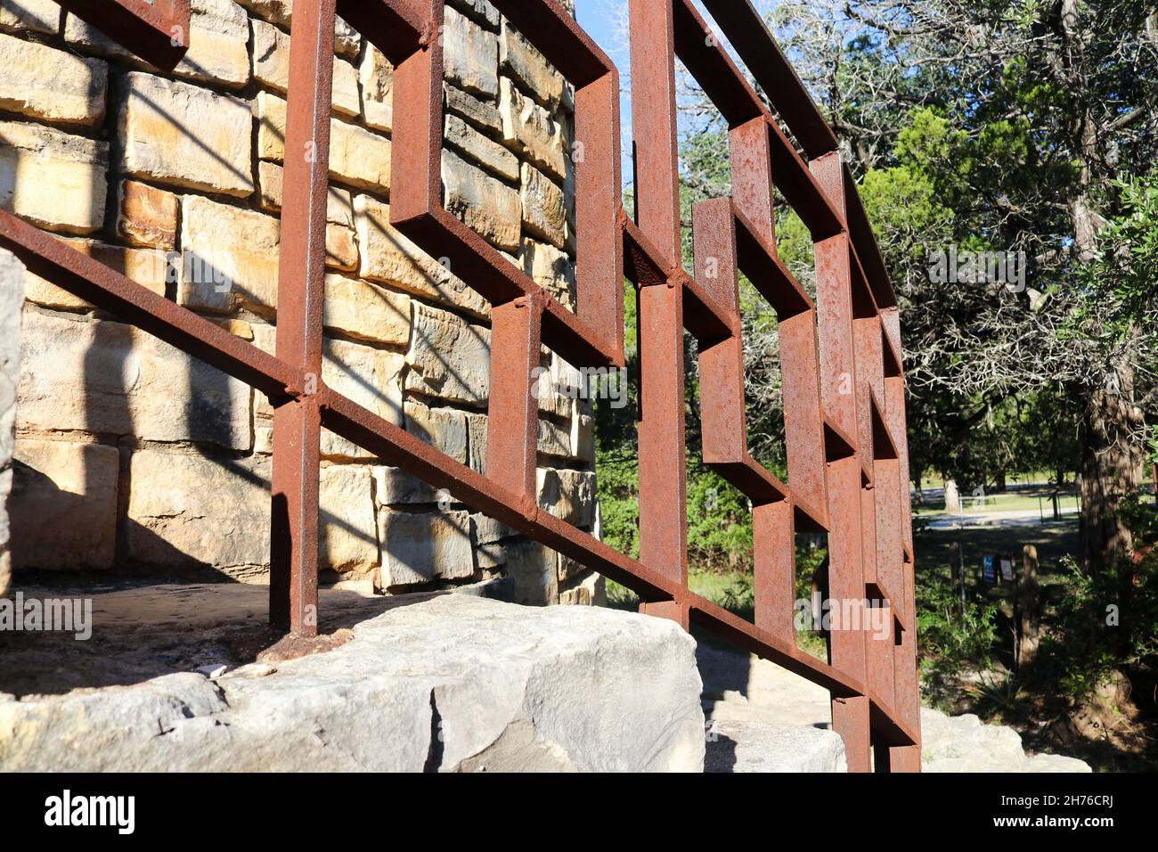 Handrail on a stone staircase leading up to a lookout tower Stock Photo ...