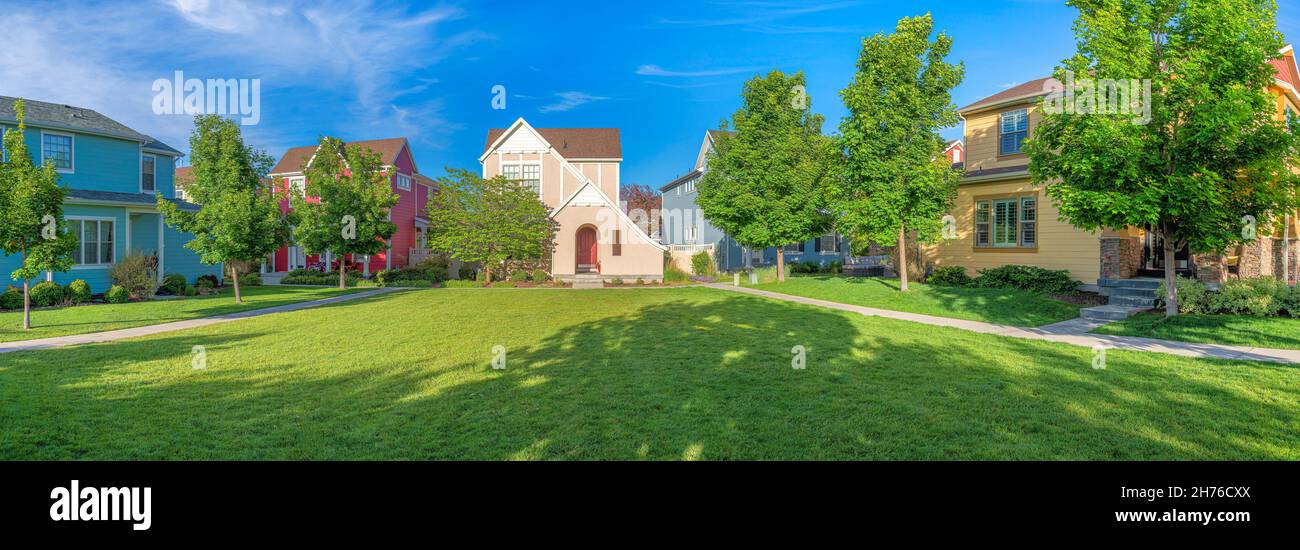 Large green field in a residential area at Daybreak, Utah. There are ...