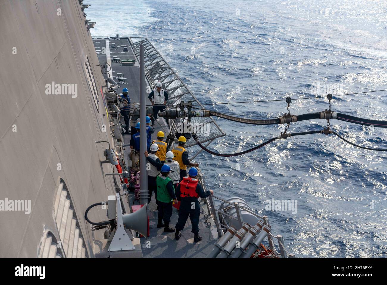 211118-N-FA490-1027 SOUTH CHINA SEA (Nov. 18, 2021) Sailors disconnect ...