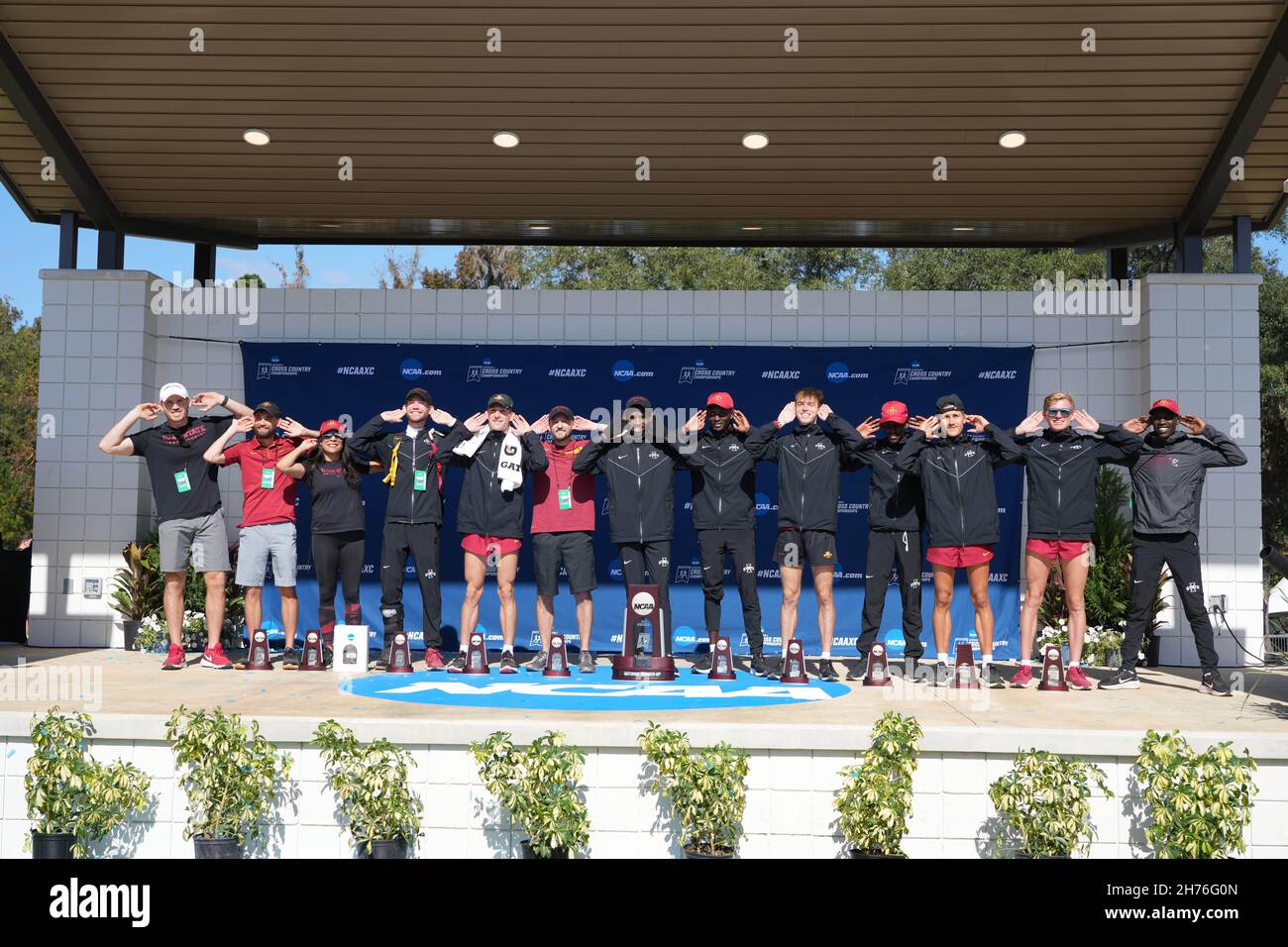 The Iowa State Cyclones cross country team and coach Martin Smith pose ...