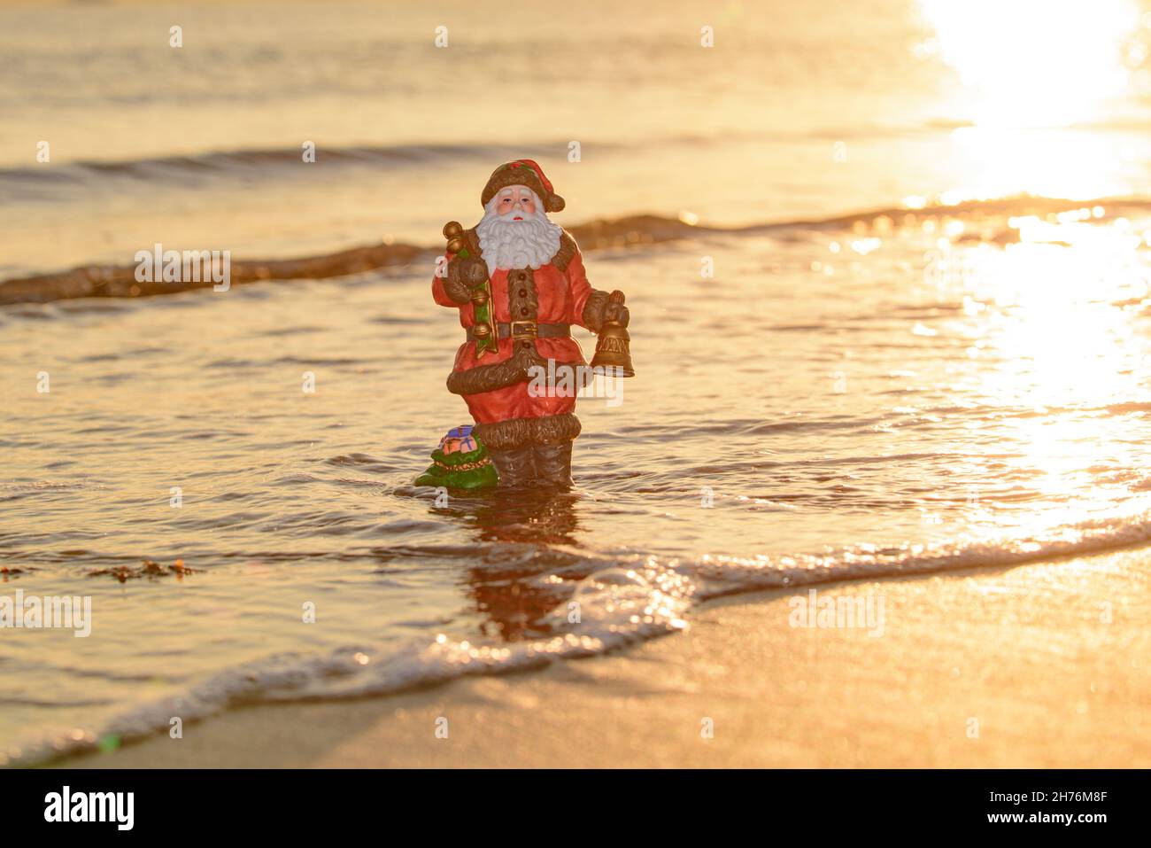 Santa on sea beach. Christmas and vacation Stock Photo - Alamy