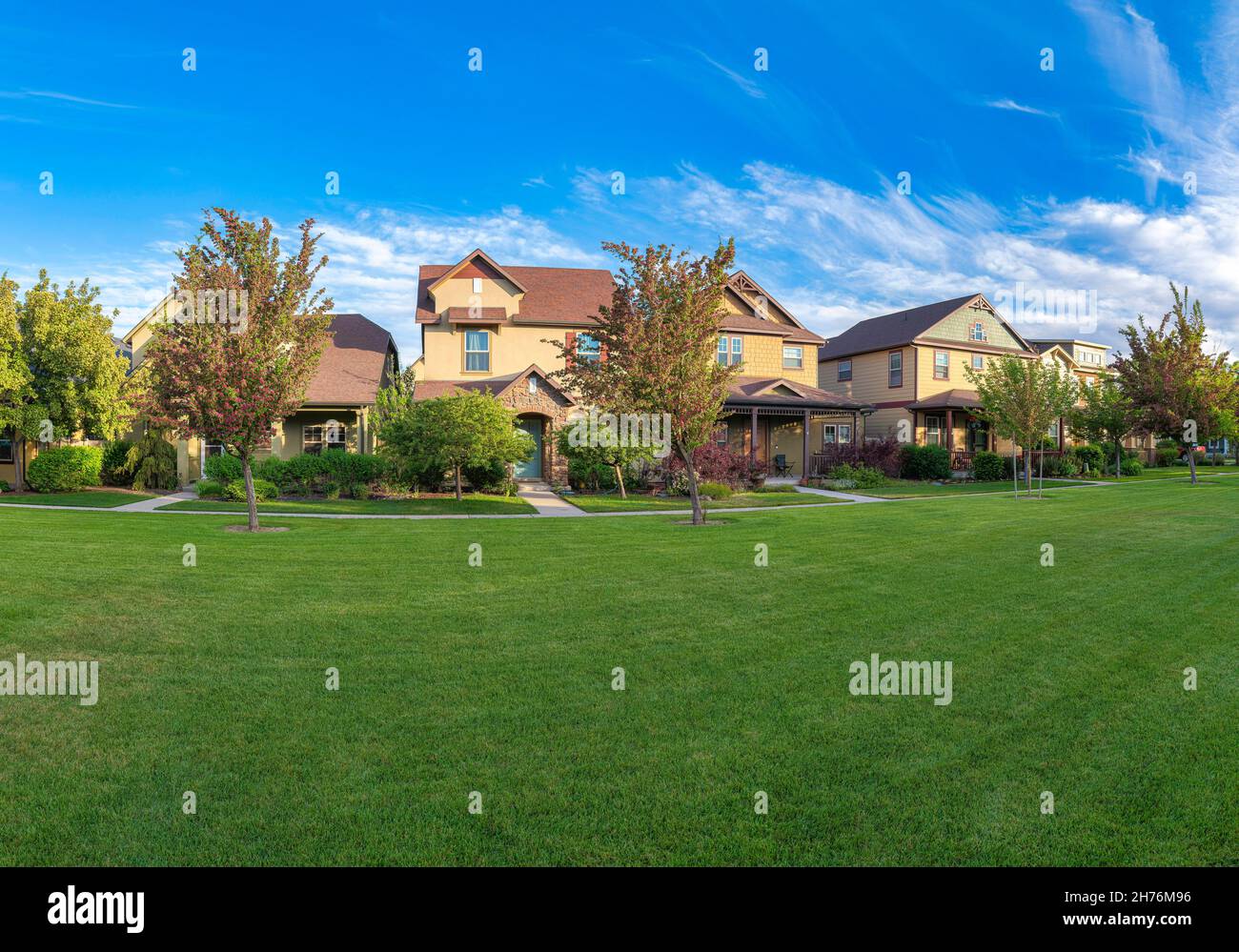 Traditional houses with yellow and brown colors at Daybreak, Utah Stock ...