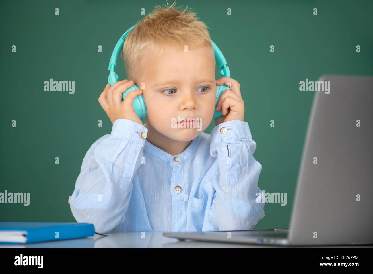 Student using headphone in classroom hi-res stock photography and ...