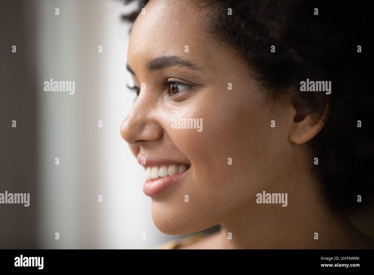 Happy beautiful young African American woman face portrait Stock Photo ...