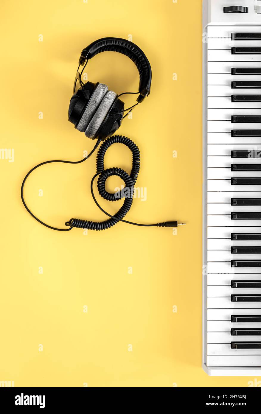 Musical flat lay background with headphones and musical keys Stock ...