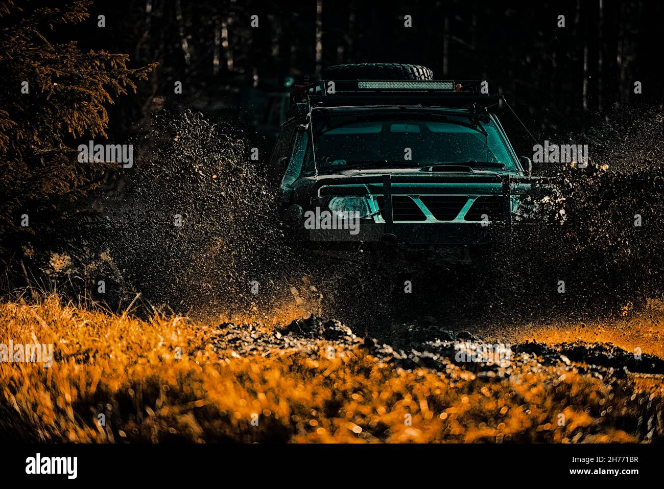 Travel concept with big 4x4 car. Off-road vehicle goes on the mountain ...